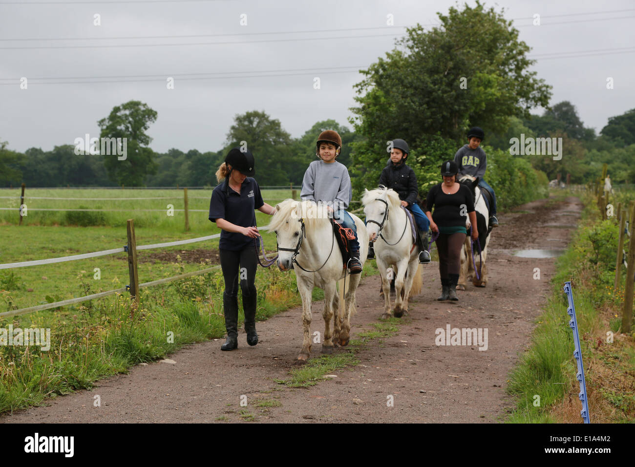 Riding lessons for kids hi-res stock photography and images - Alamy