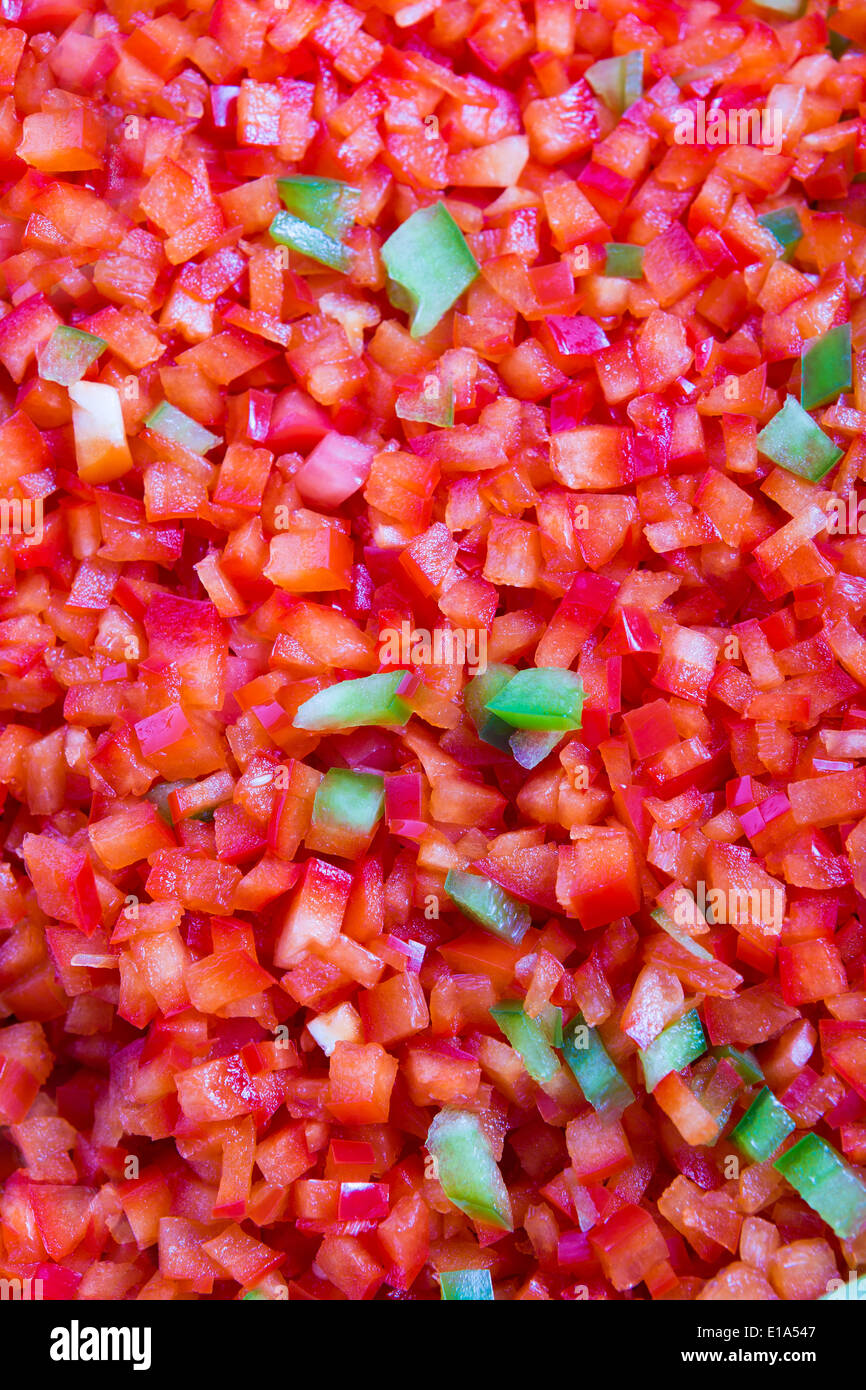 Red and some green belll peppers cleaned and washed as cooking ...