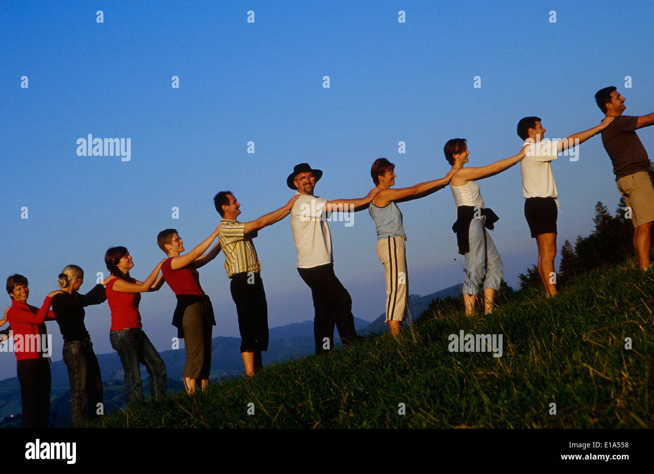 Chain of women hi-res stock photography and images - Alamy