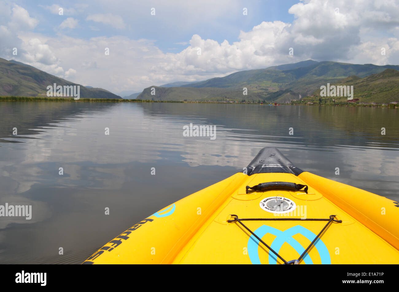 SUP Stand Up Paddleboarding on a lake close to Cusco, Peru with the ...