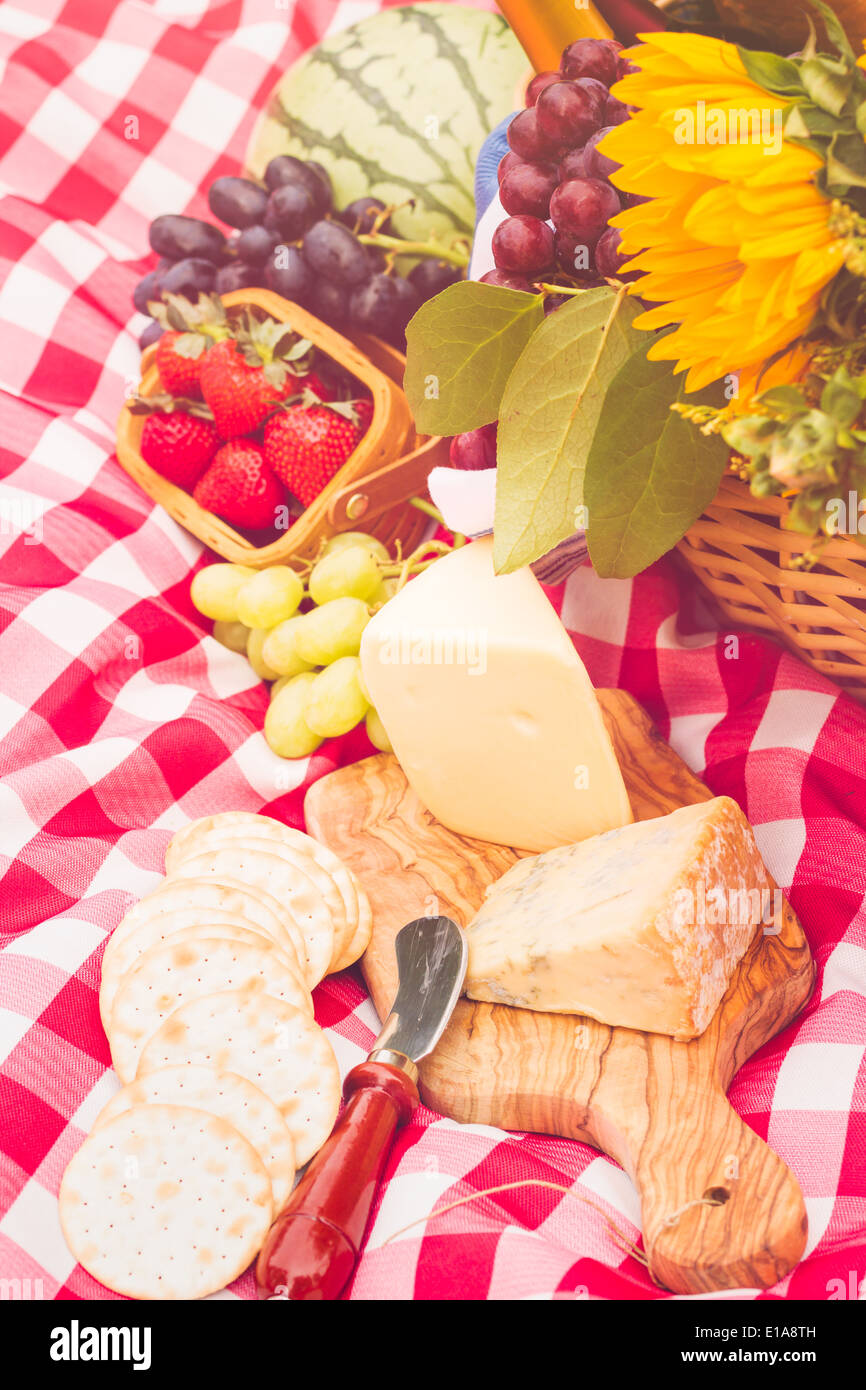 Summer picnic with a basket of food in the park Stock Photo - Alamy
