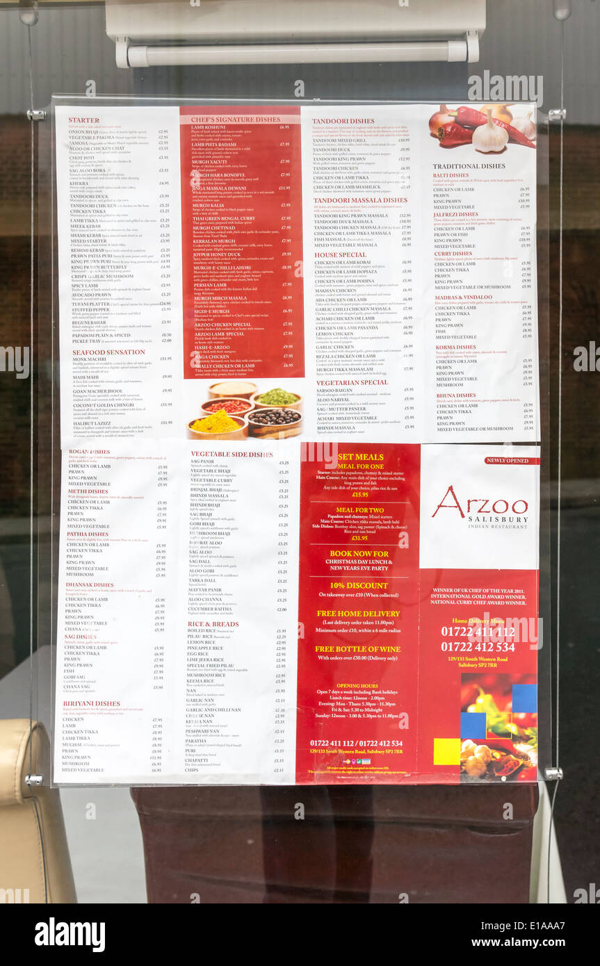 Menu displayed in window of Asian restaurant UK Stock Photo - Alamy