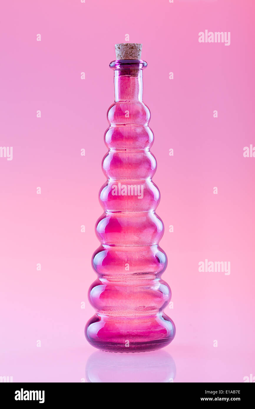 Empty pink conical shaped glass bottle hi-res stock photography and ...