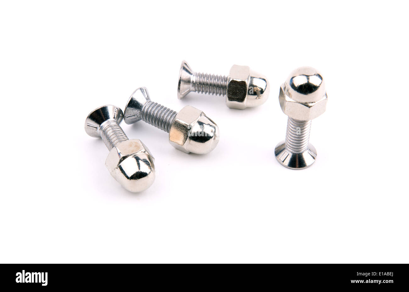 Chrome bolts with spherical nut on white background Stock Photo - Alamy