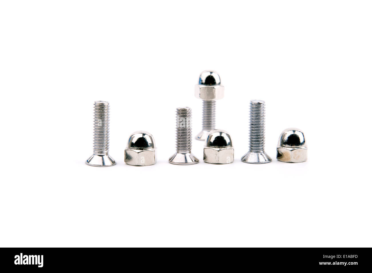 Chrome bolts with spherical nut on white background Stock Photo - Alamy