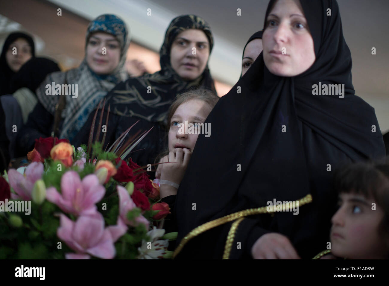 Tehran, Iran. 28th May, 2014. Syrian women living in Iran line-up as ...