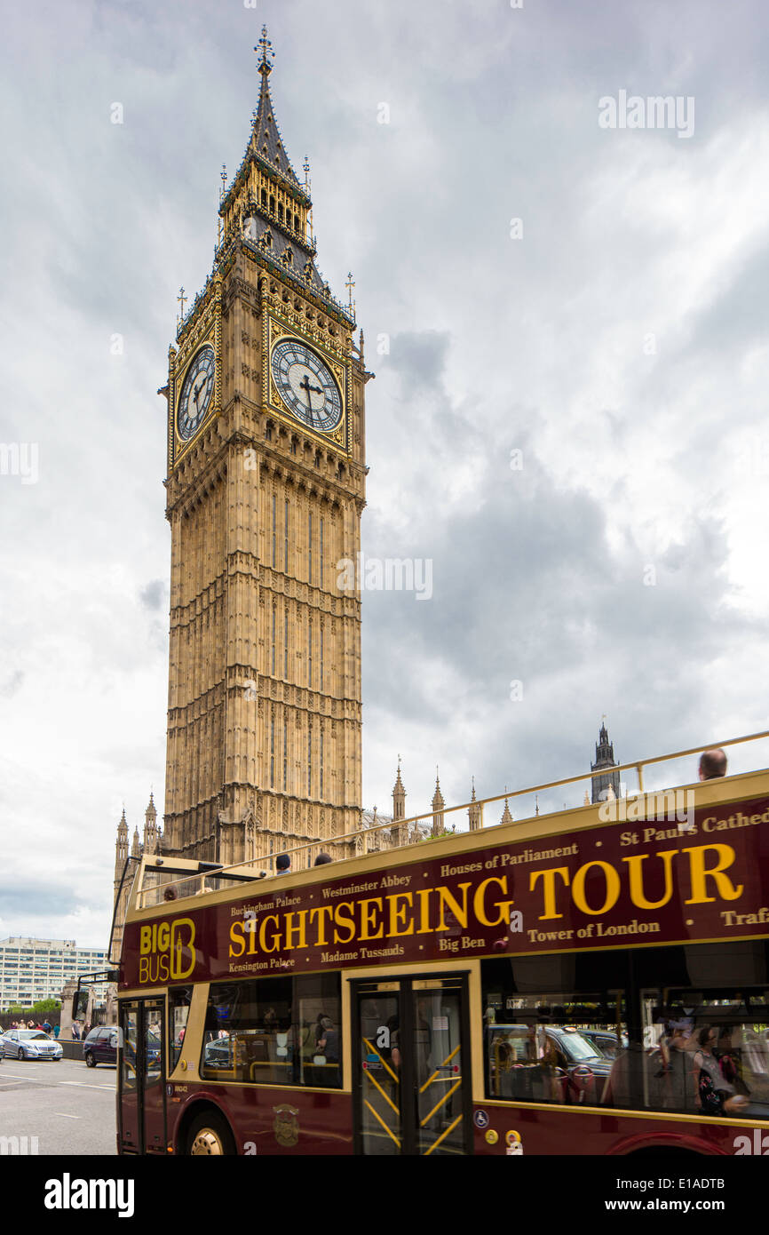 Open top sightseeing tour bus passing Big Ben, London, England, UK ...