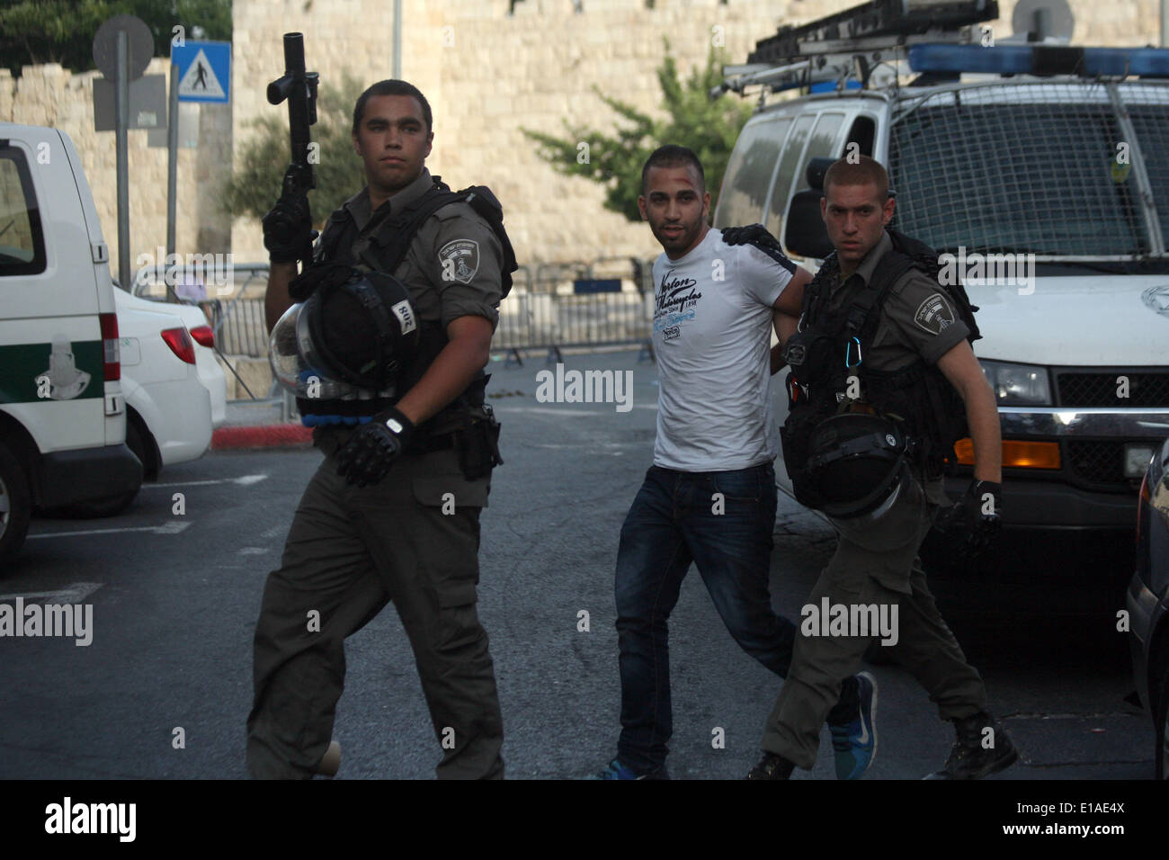 Jerusalem, Israel. 28th May, 2014. Israeli border guards detain a ...