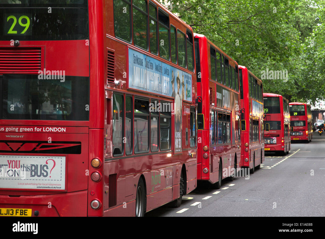 A row of red buses London, England, UK Stock Photo - Alamy
