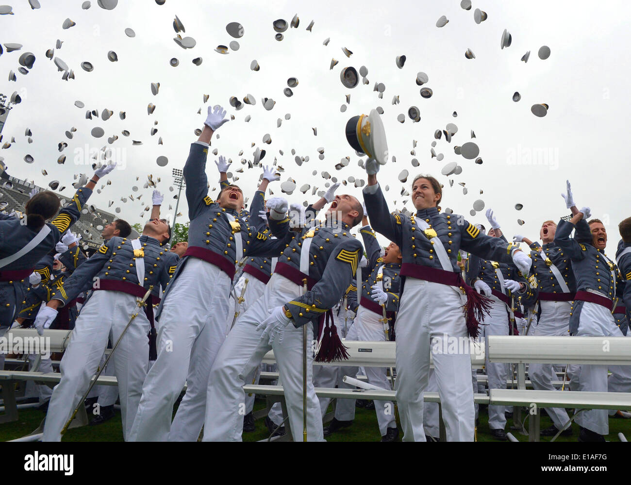 West Point, USA. 28th May, 2014. Cadets toss their hats in the air ...