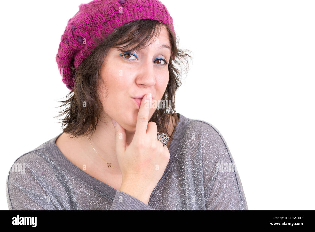 Distrustful skeptical woman with misgivings looking at the camera with ...