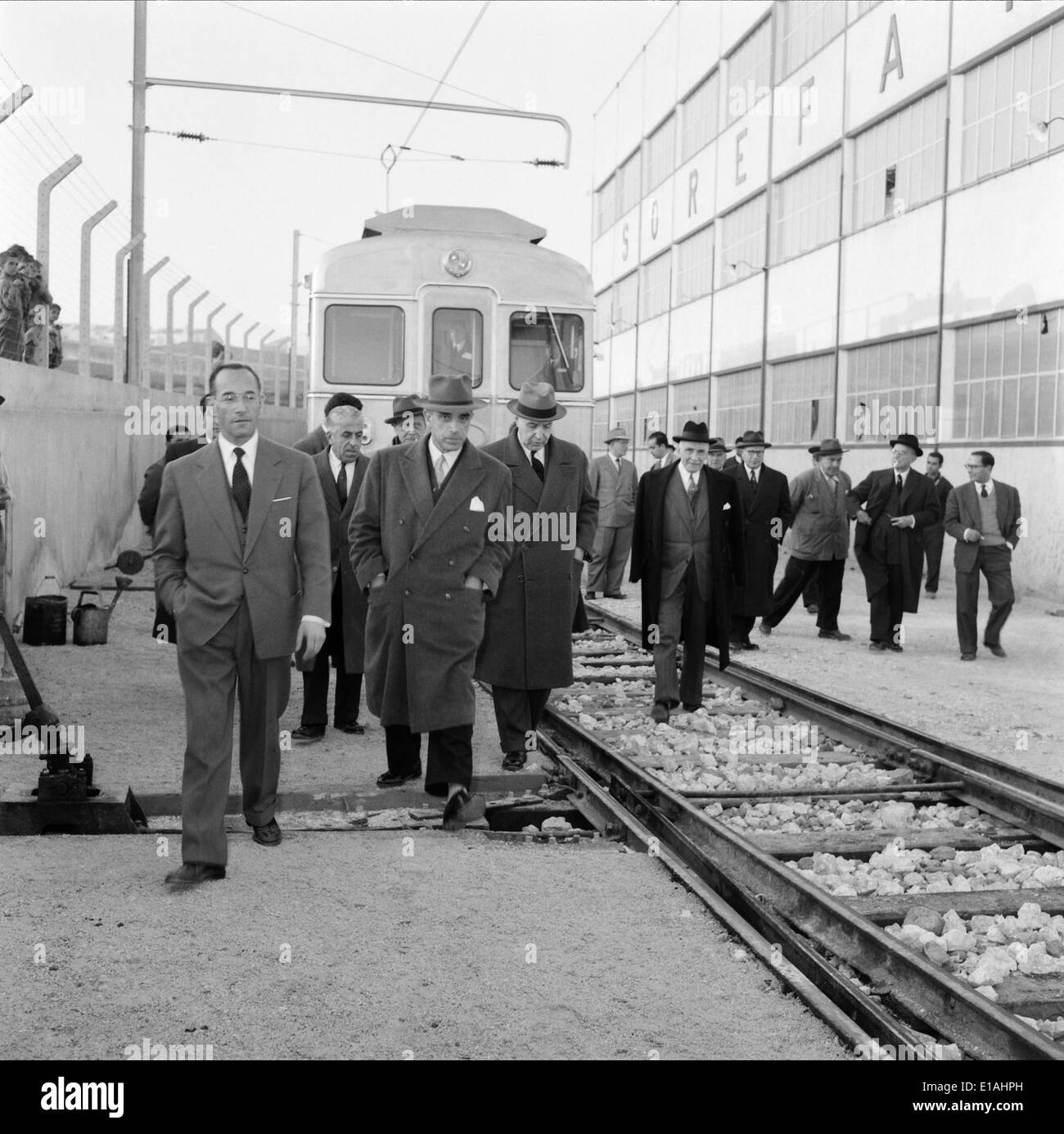 This photograph features a train (comboio) in Portugal, highlighting ...