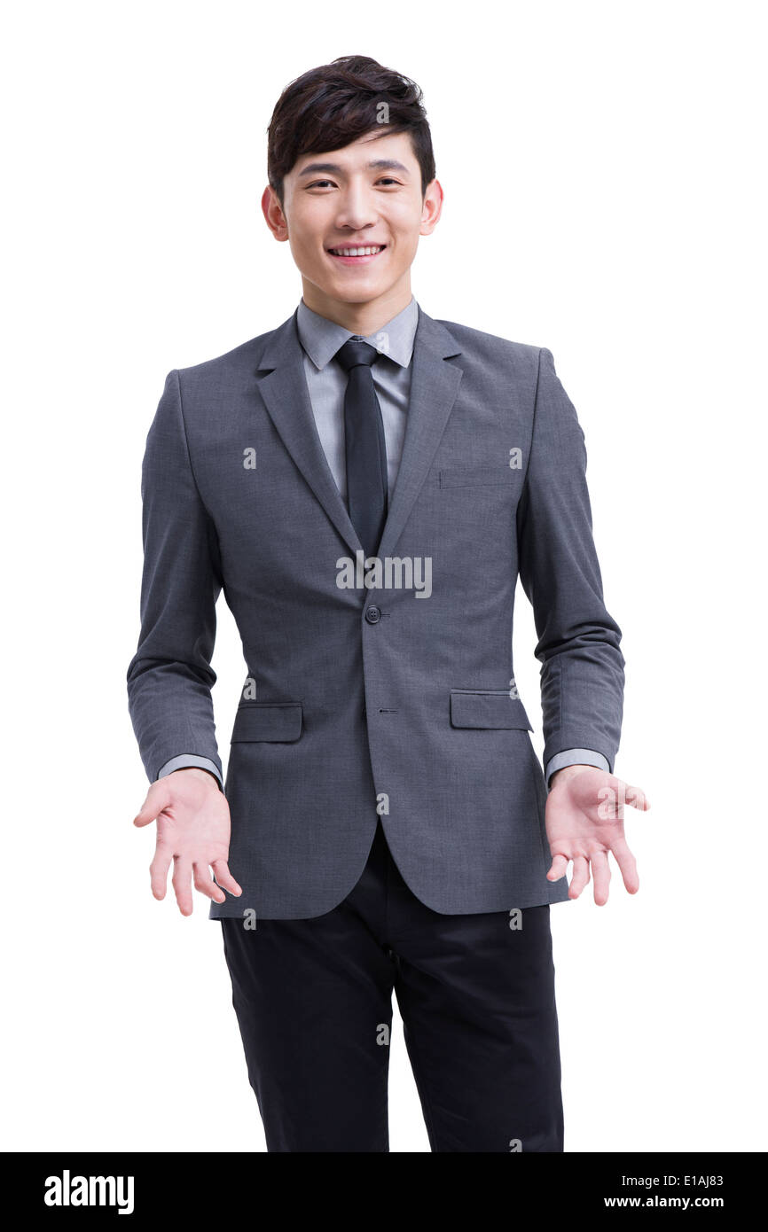 Young businessman shrugging Stock Photo - Alamy