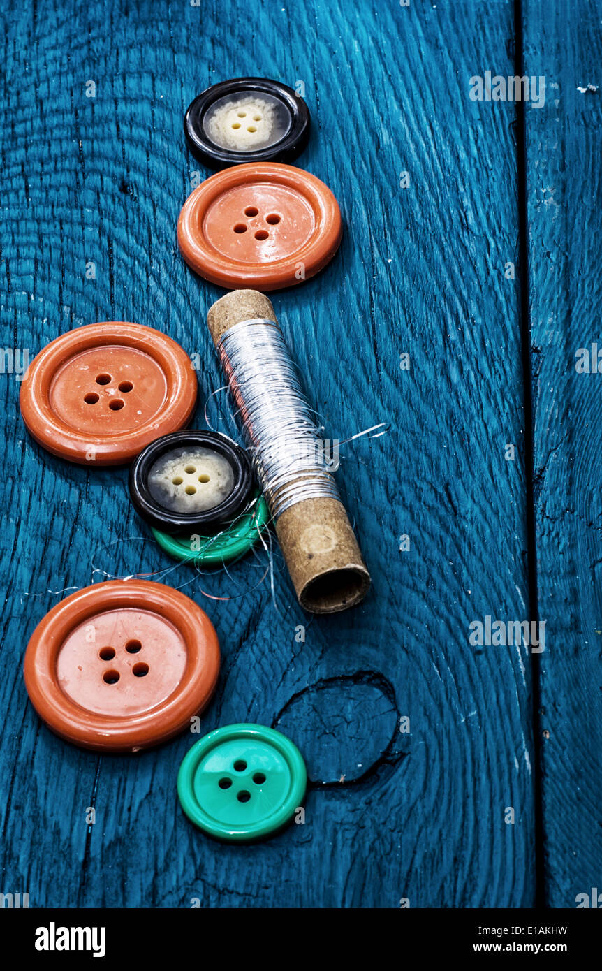 different buttons and zipper on the background of sewing tool Stock ...