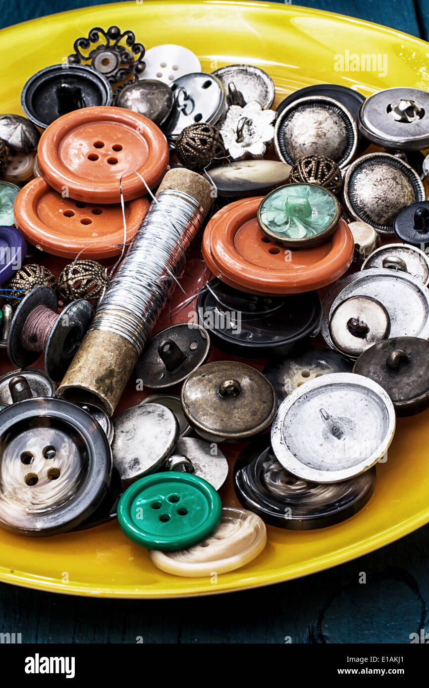 different buttons and zipper on the background of sewing tool Stock ...