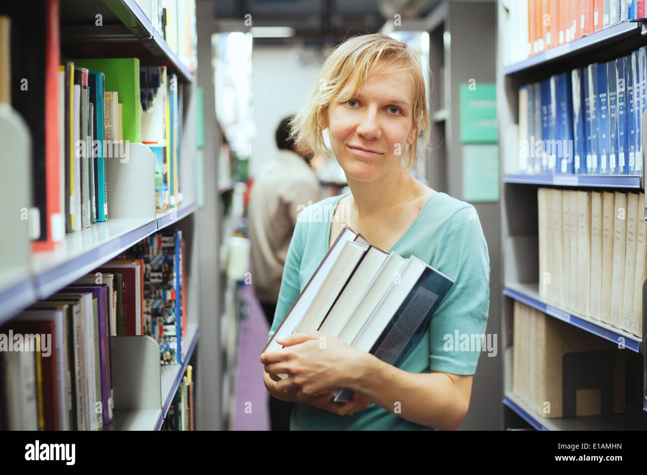 student with books Stock Photo - Alamy
