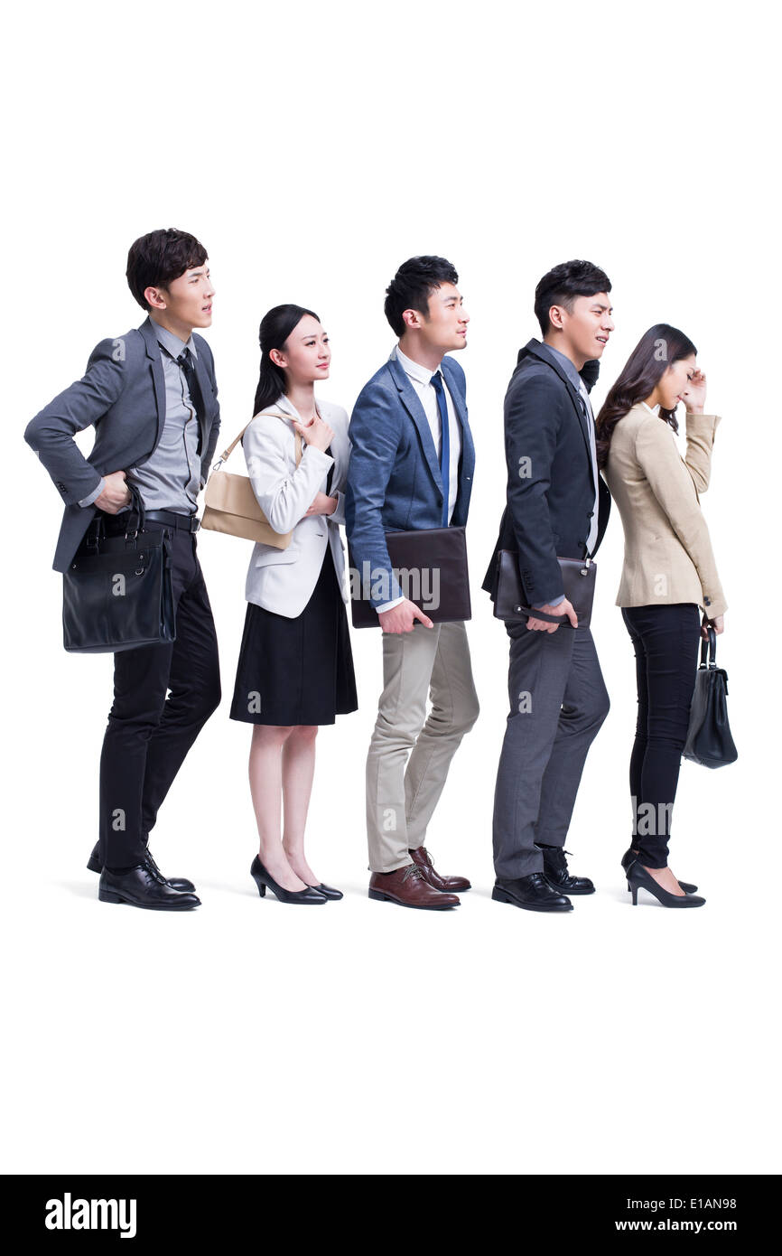 Young commuters waiting in line Stock Photo - Alamy