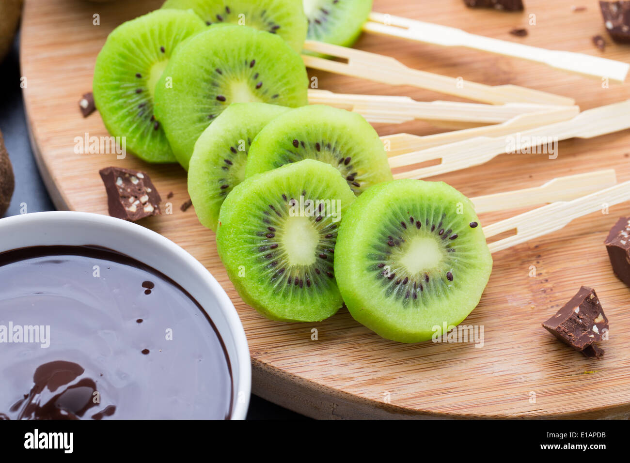 Fruits with chocolate on a stick Stock Photo - Alamy