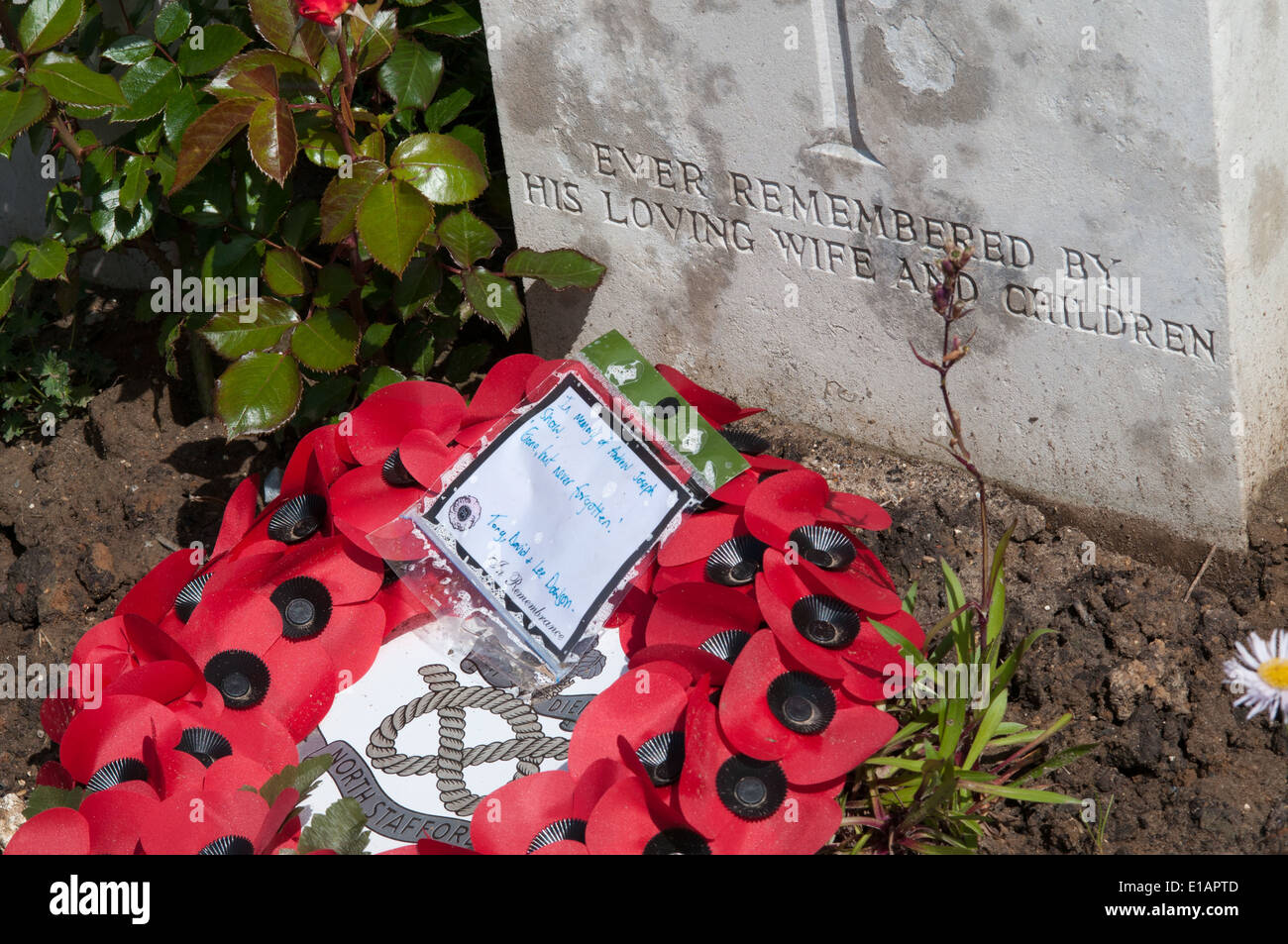 Poppy wreath laid at British war grave in Etaples Military Cemetery ...