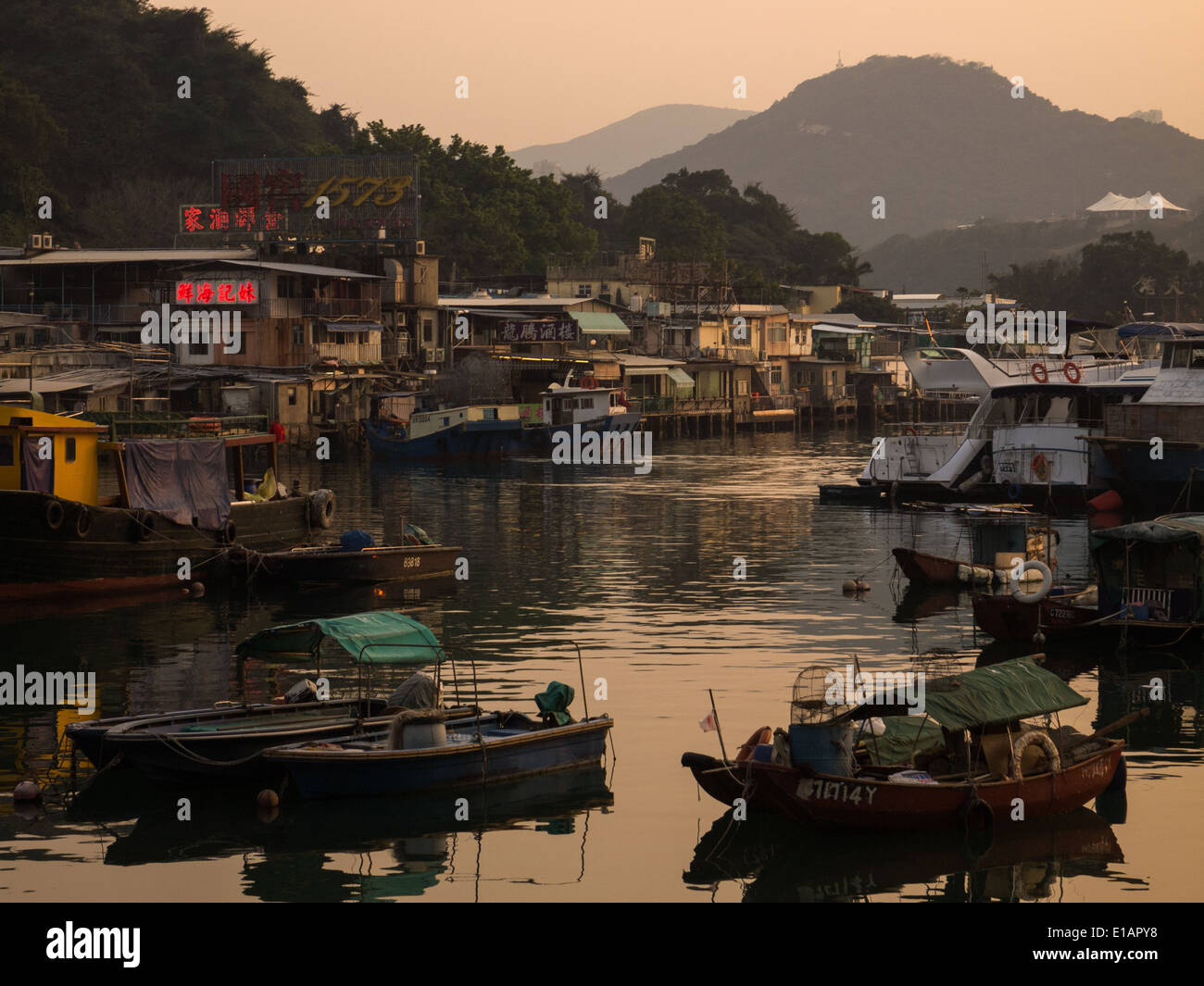 Stilt houses, pile dwellings, palafitte, sampan, fishing boat, motor ...