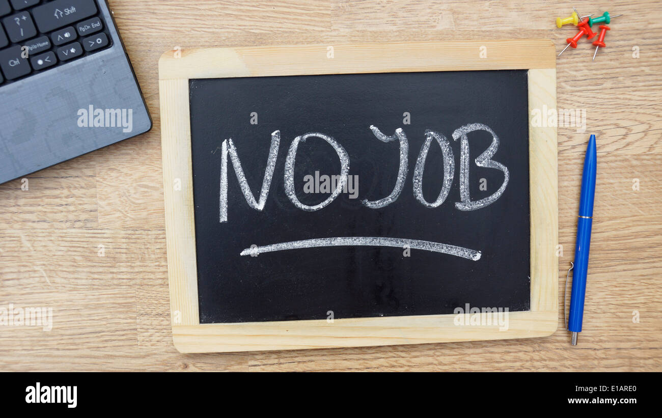 No job written on a chalkboard at the office Stock Photo - Alamy