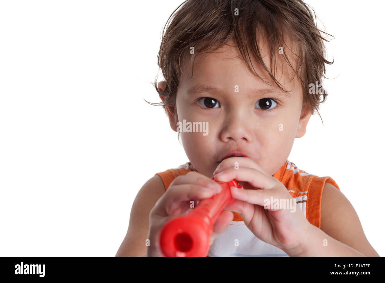 Little boy playing the recorder Stock Photo - Alamy