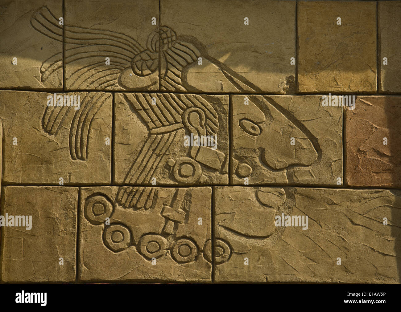 Maya art Indian human head bas-relief Stock Photo - Alamy