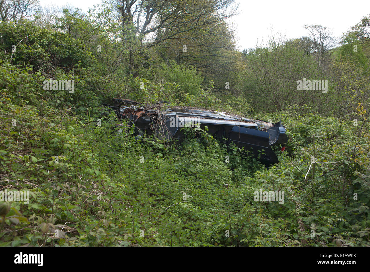 A crashed car beside the A374 road at Trerule Foot near Saltash, which ...