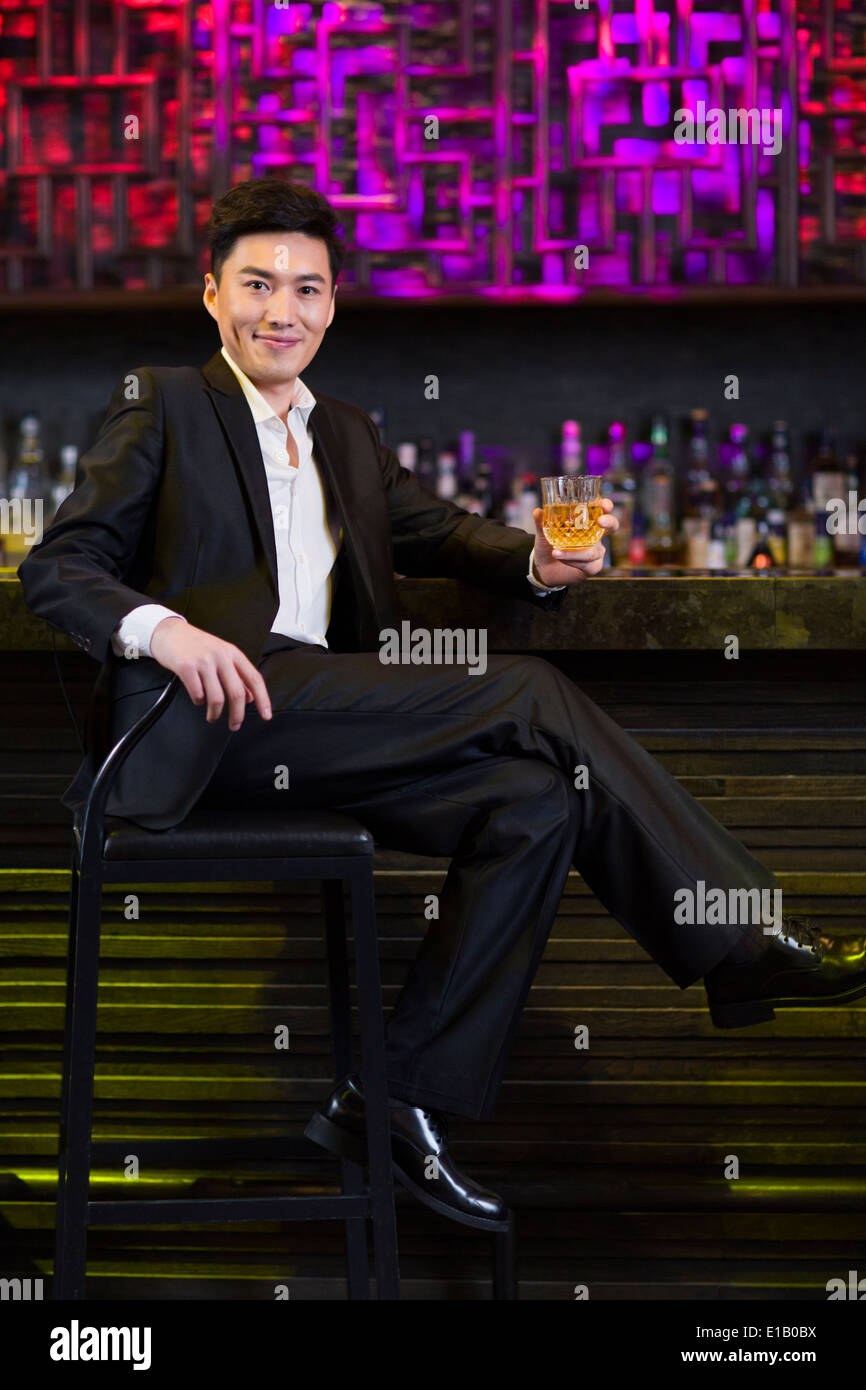 Men drinking bar stool hi-res stock photography and images - Alamy