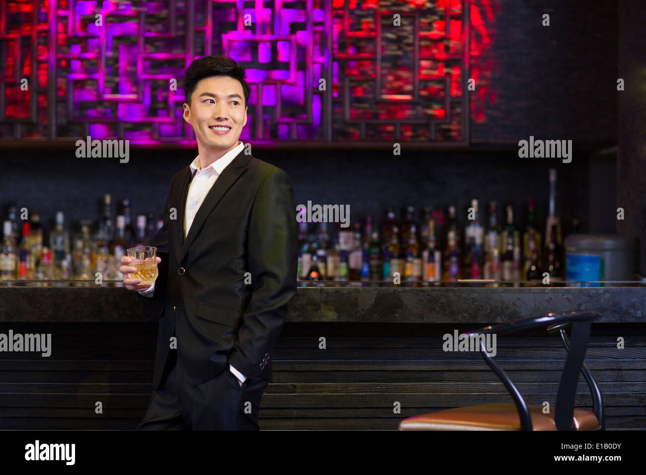 Men drinking bar stool hi-res stock photography and images - Alamy