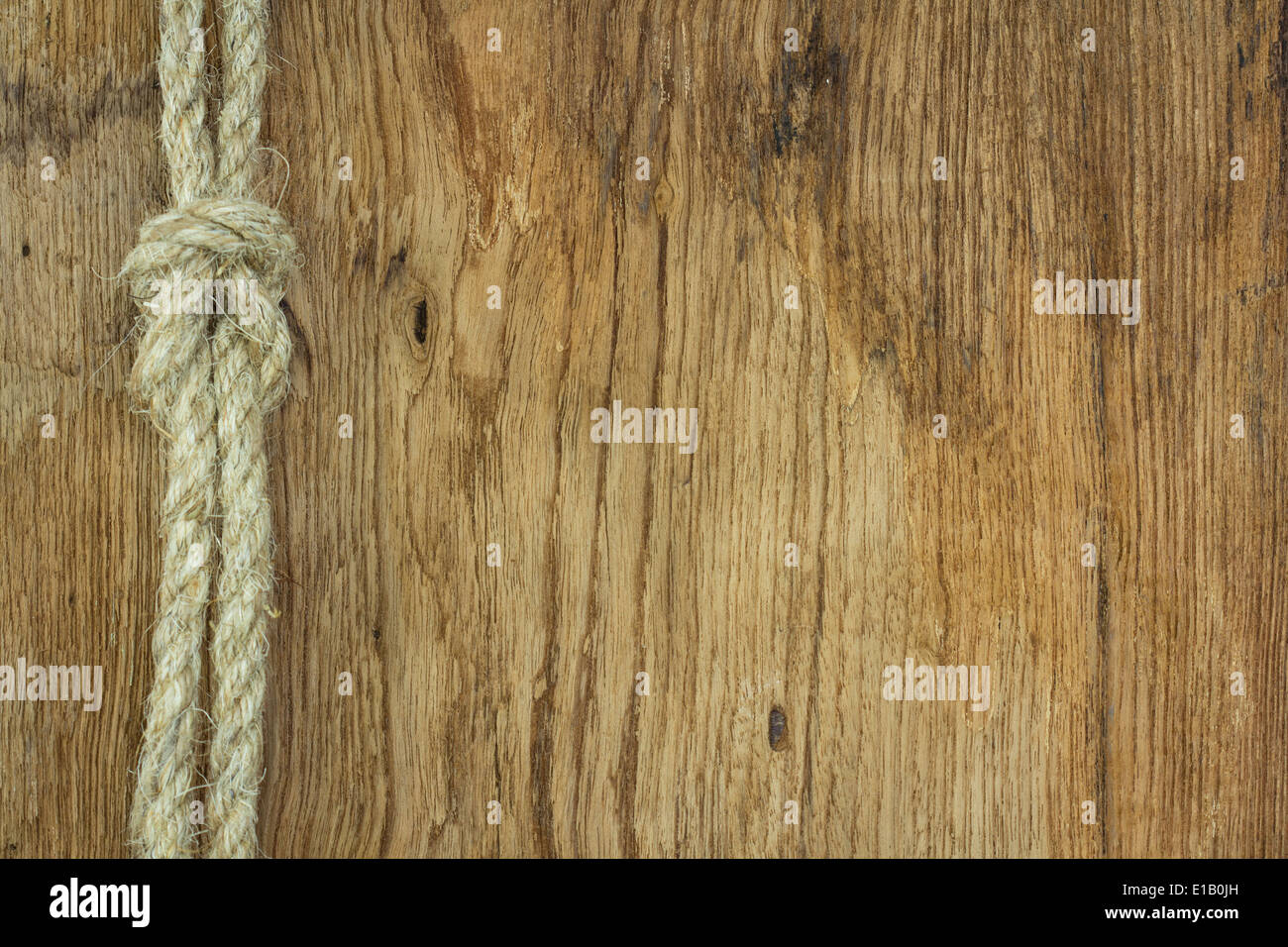 rope on wooden texture background Stock Photo - Alamy