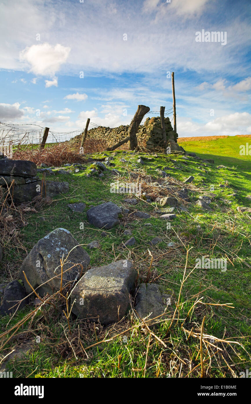 Crumbling stone wall on an exposed hillside in South Wales Stock Photo ...