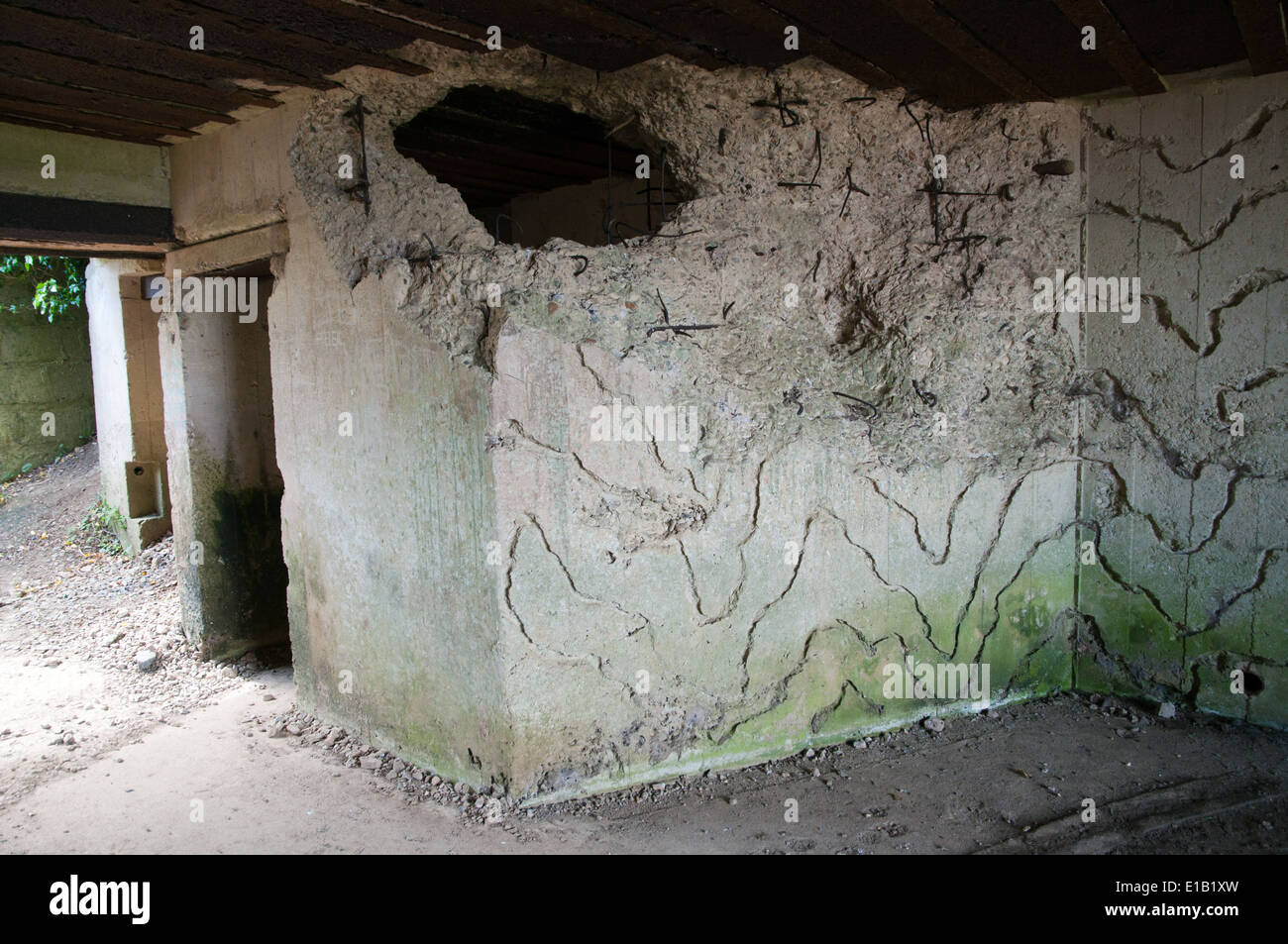Shell hole in German bunker overlooking Omaha beach, Normandy, France ...
