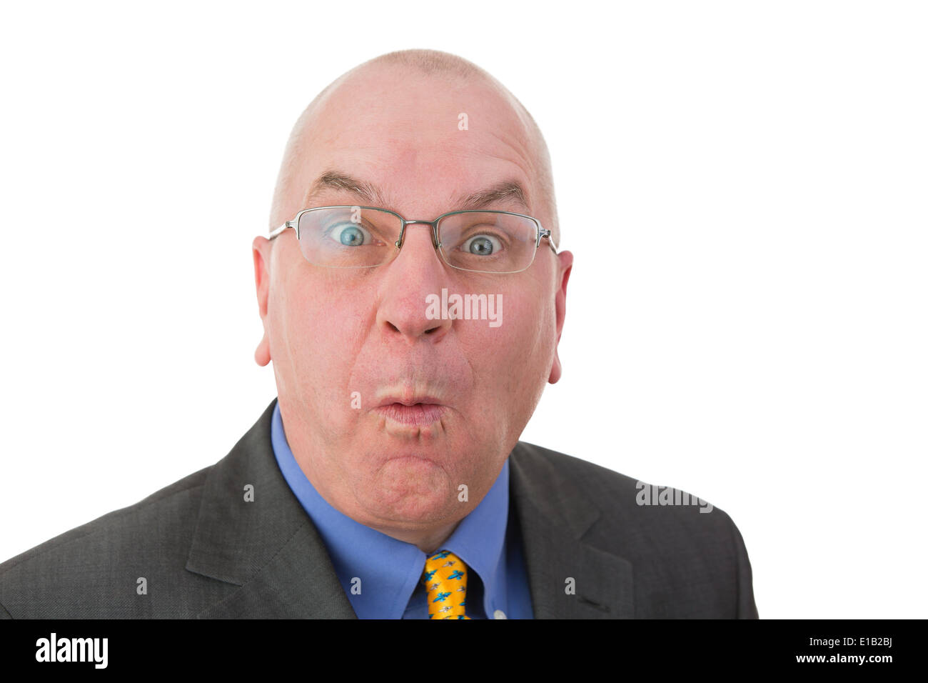 Businessman with a skeptical look of amazement looking at the camera ...