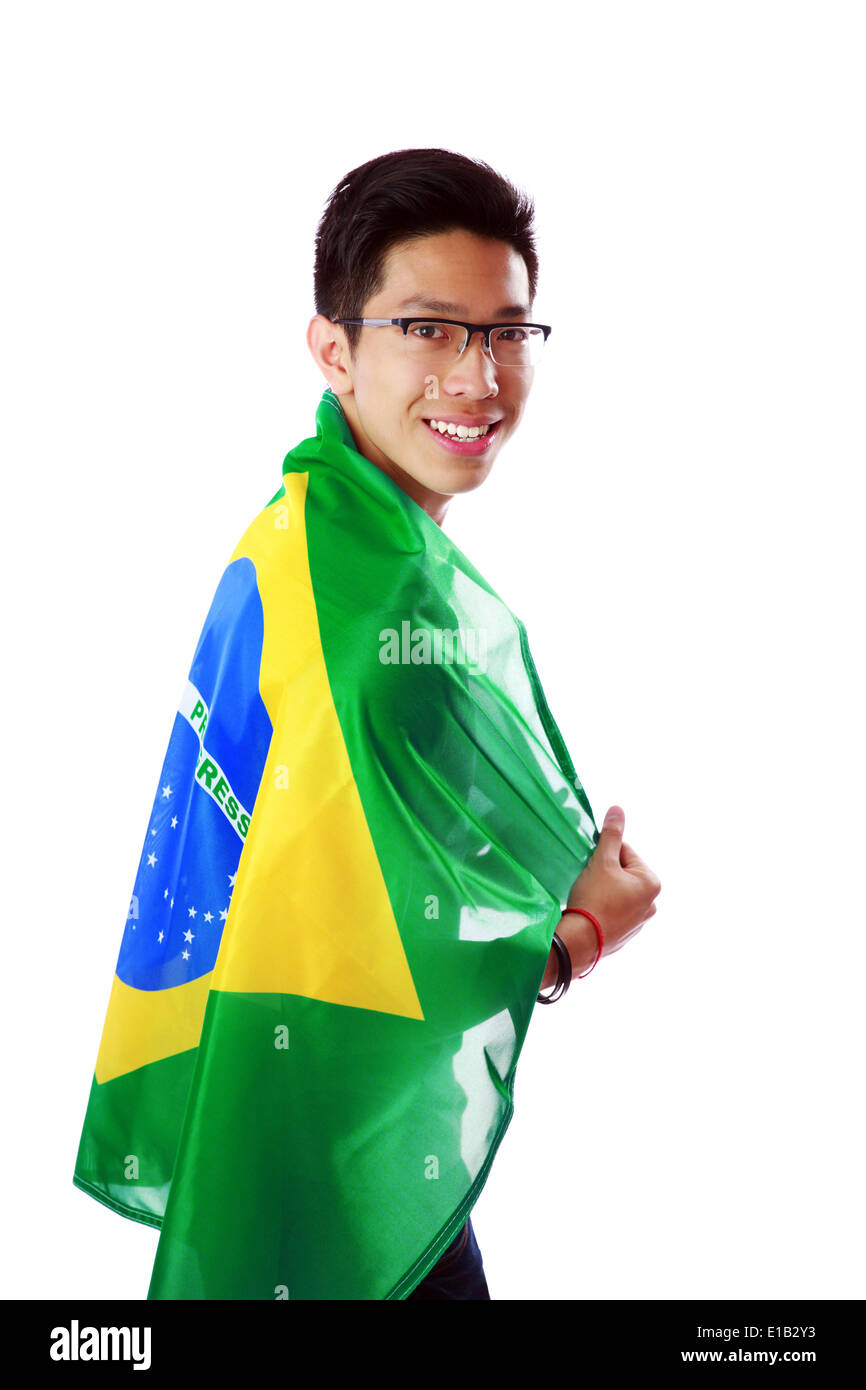 Side view portrait of a man holding Brazilian flag over white ...