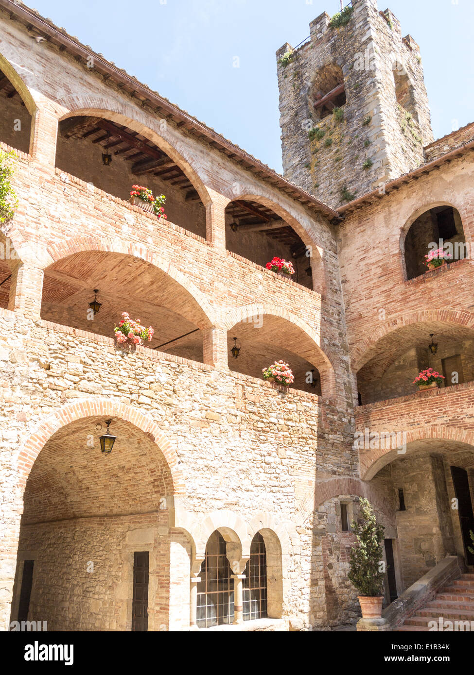 Medieval Castle with tower and arches into the main square Stock Photo ...