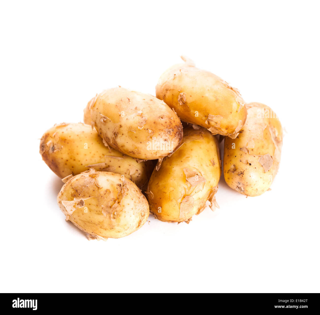 Young potato vegetable isolated on a white background Stock Photo - Alamy