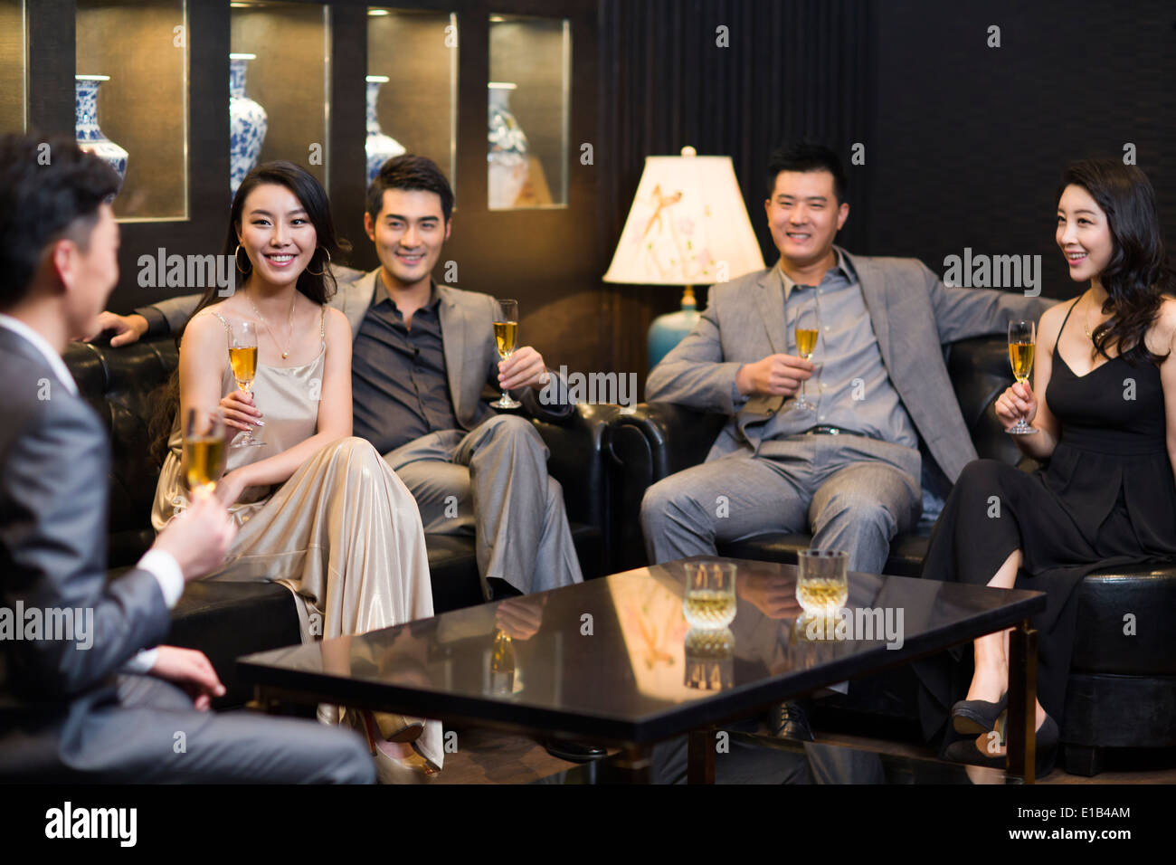 Five adults in luxury hi-res stock photography and images - Alamy