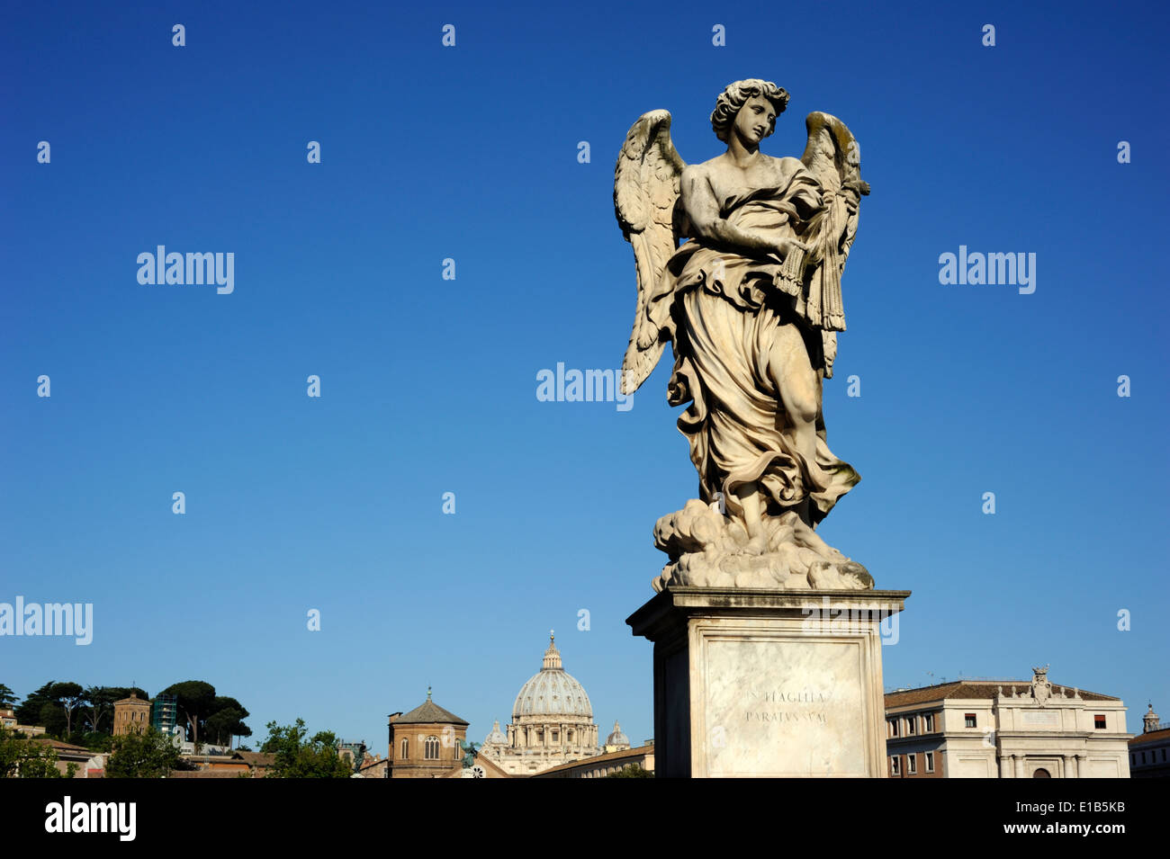 Italy, Rome, angel statue on Sant'Angelo bridge and St Peter's basilica ...