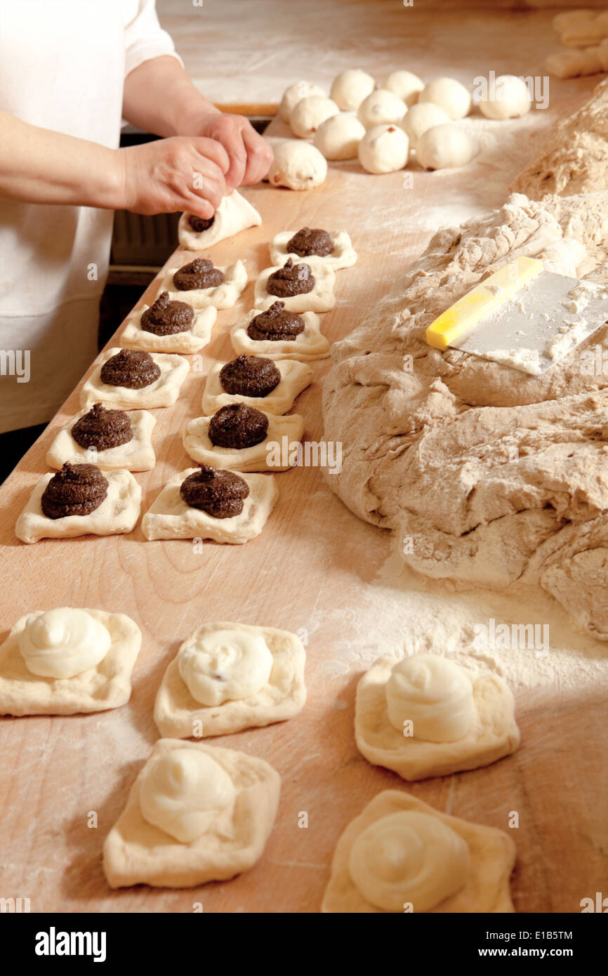 Professional Bakery - Baker Making Sweet Pastry Stock Photo - Alamy