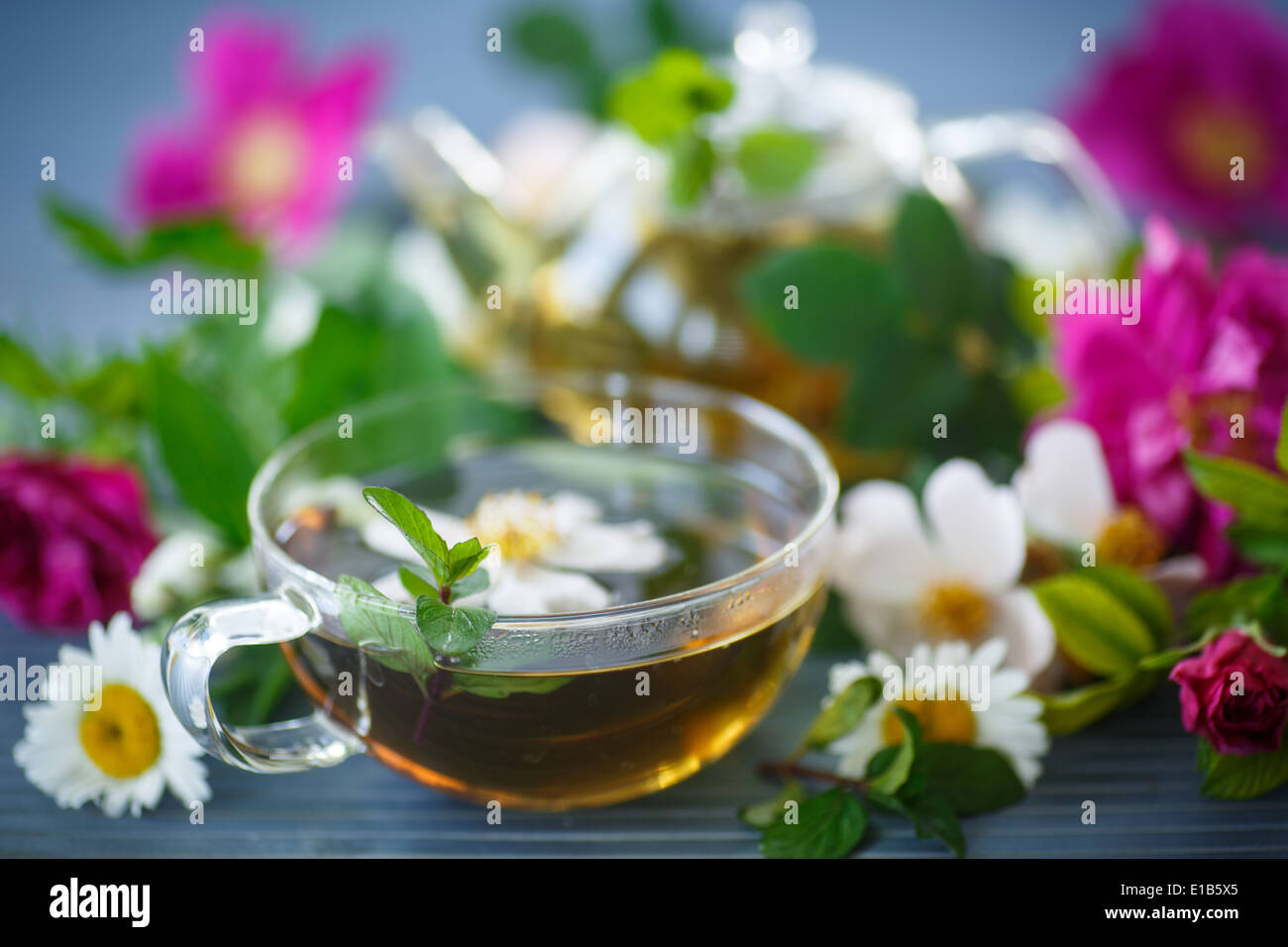 flower tea of different flowers in a teapot on the table Stock Photo ...
