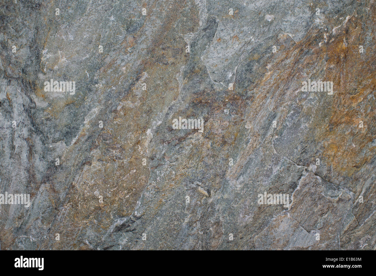 Stone background texture of a piece of slate with a rough surface used ...