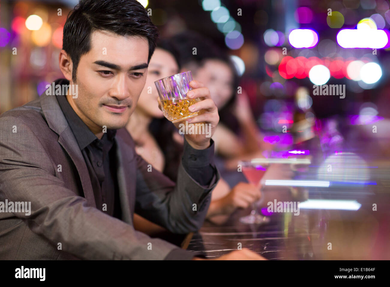 Man drinking martini hi-res stock photography and images - Alamy