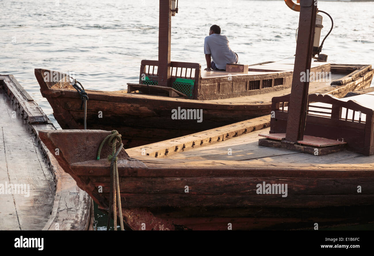 Traditional Abra boat at the pier in Dubai Stock Photo - Alamy