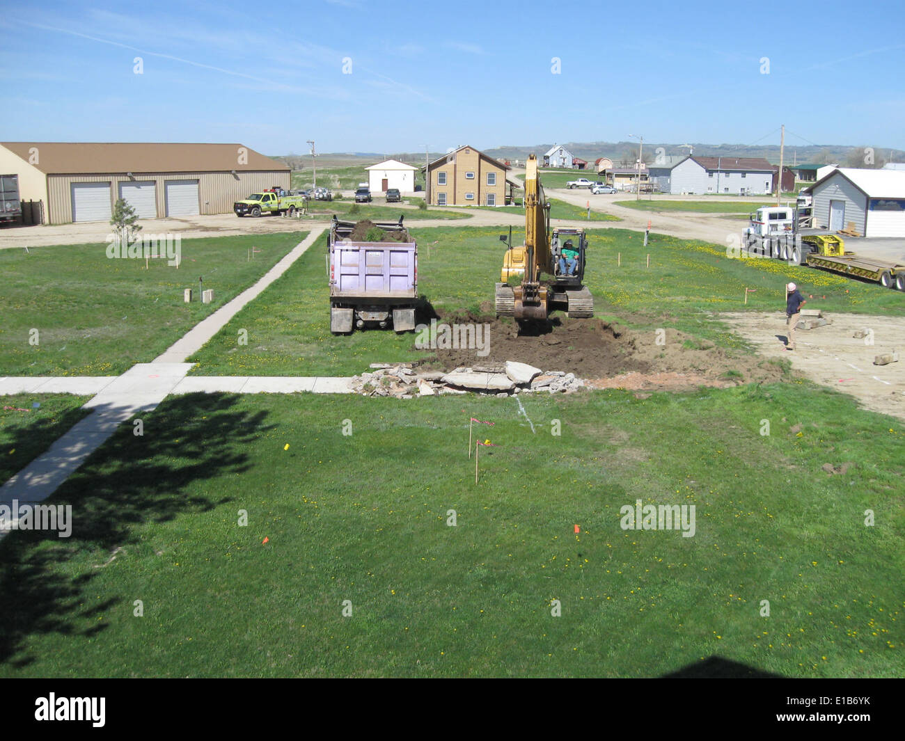 The first scoops of foundation are laid in Camp Crook, located in the ...