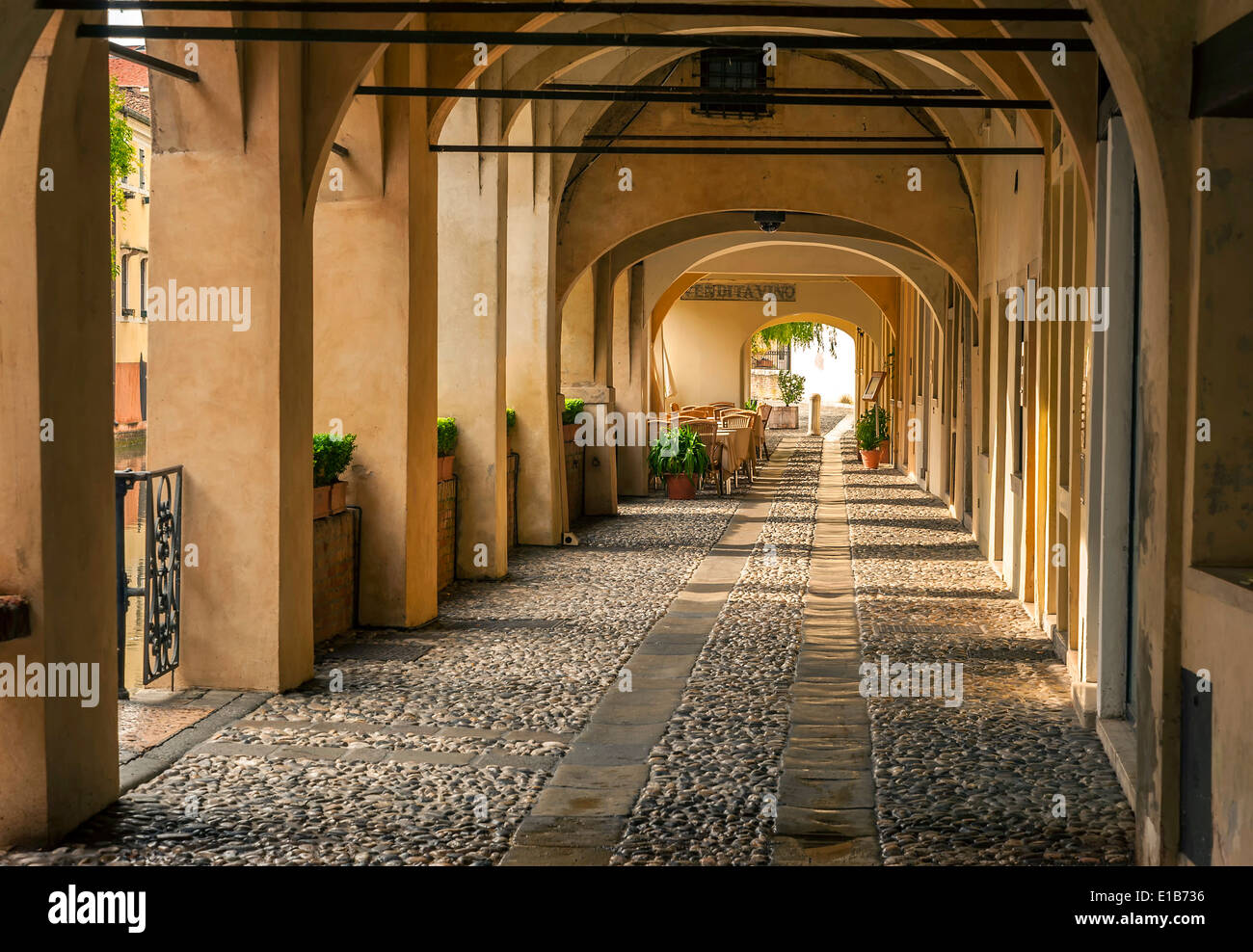 Cobbled and arched walkway in Treviso, Italy Stock Photo - Alamy
