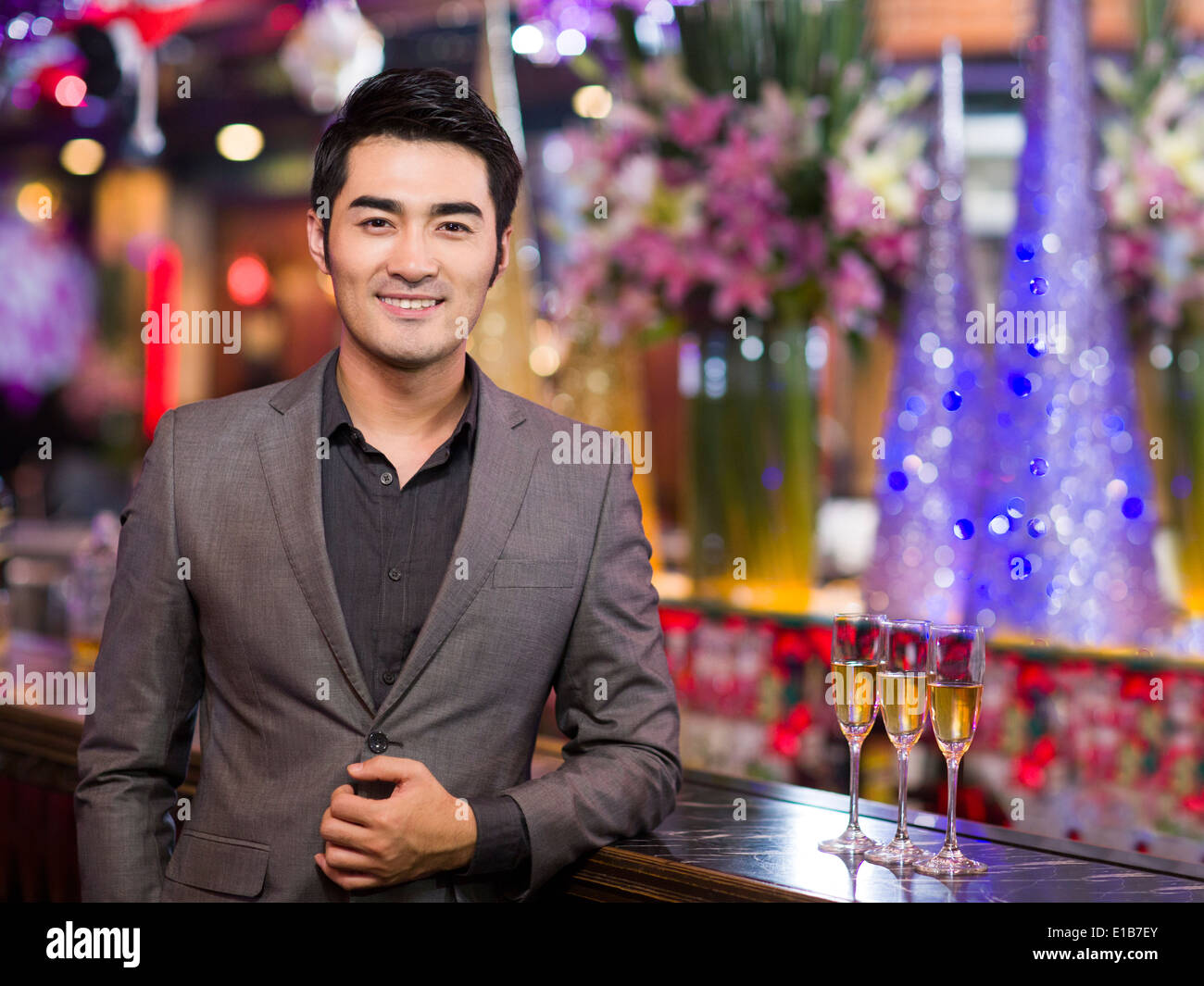 Young bar owner Stock Photo - Alamy