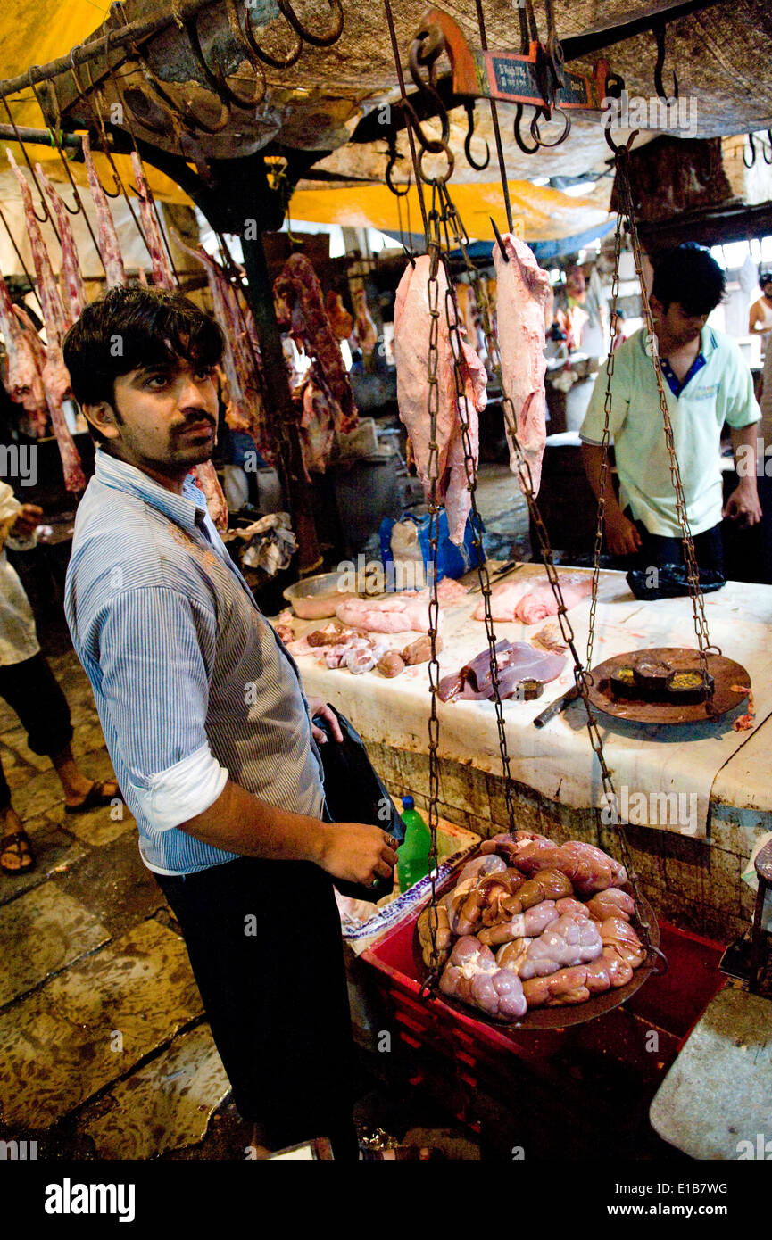 Scenes at the meat market an open air butcher's shop where meats ar ...