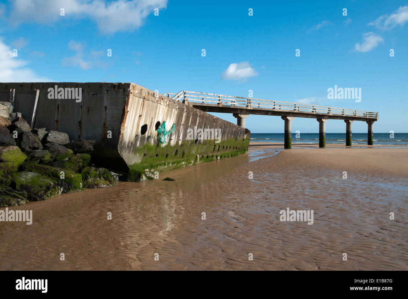 Remains of a section of the Mulberry Harbour, Omaha Beach, Normandy ...