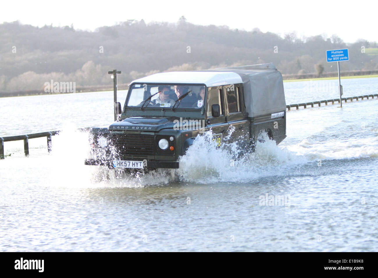 Land Rover driving through flood water Stock Photo - Alamy